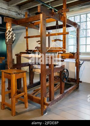 A simple hand-operated loom. A loom is a device used to weave cloth and ...