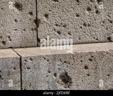 Close-up of the shrapnel and bomb damage on the remains of Coventry ...