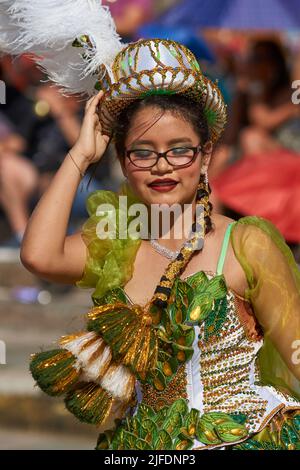 Dancers perform La Morenada during festivities honoring Santiago ...