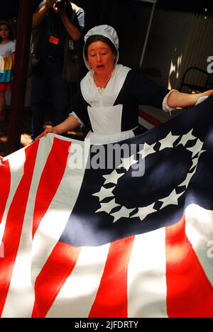 Betsy Ross, reenactor with Historic Philadelphia poses on the red ...