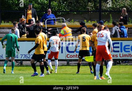 Blackpool and Southport fans clash in the stands as the referee is ...