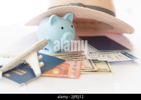 Save money for airplane tickets, planning travel budget concept ...