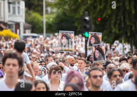 ILFORD, LONDON, ENGLAND- 2nd July 2022: People taking part in a silent ...