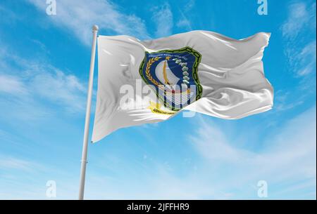 official flag of Riau Islands Indonesia at cloudy sky background on ...