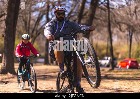 Bicycle riders gather to enjoy their love of bikes with their kids ...