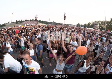 The audience attending the Italian singer Cesare Cremonini concert at ...
