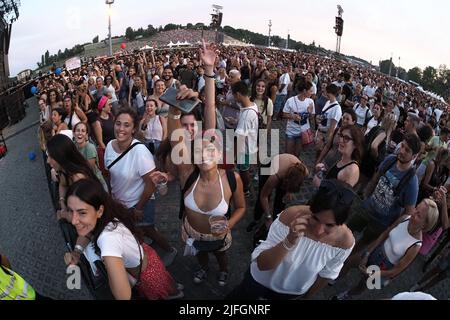The audience attending the Italian singer Cesare Cremonini concert at ...