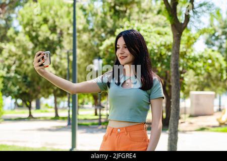 Photo of funny brunette hair millennial lady point look empty space ...