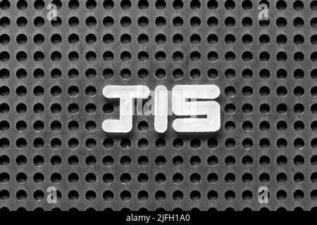 Alphabet letter in word JIS (abbreviation of Just in sequence) on green ...