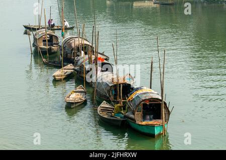 A row of narrowboats belonging to gypsies moored at a canal near Meghna ...