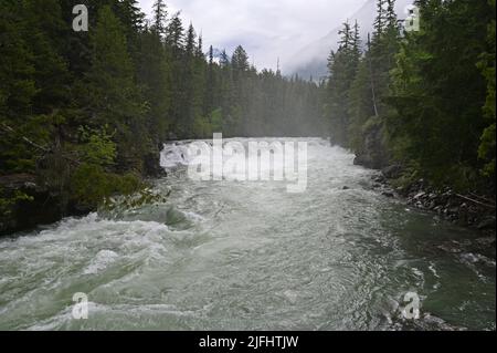 High levels and torrential water flow in McDonald Creek in Glacier ...