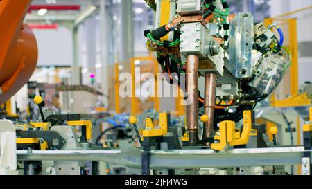 Robotic mechanism, industrial robot iin motion at the modern factory ...
