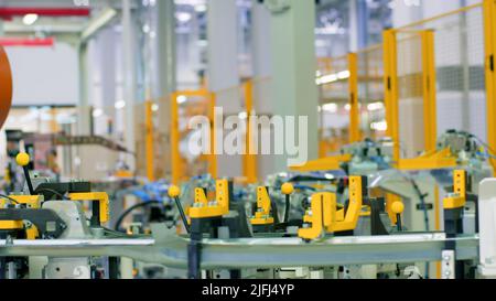Robotic mechanism, industrial robot iin motion at the modern factory ...