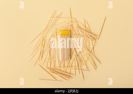 Holder with toothpicks on color background Stock Photo - Alamy