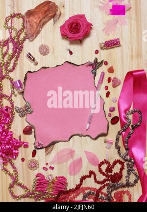 Pink and Magenta Jewelry With Rose and Blank Paper and Pen With Burned ...