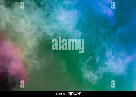 Smoke from canned firework. Looks like colorful clouds Stock Photo - Alamy