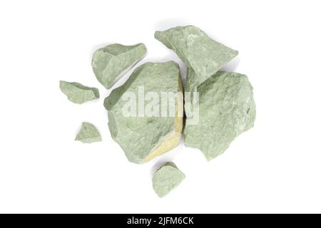 Green cosmetic clay in pieces and powder - top view Stock Photo - Alamy