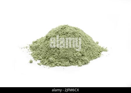 Green cosmetic clay powder isolated on white background - top view ...