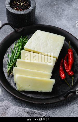 Cyprus Halloumi cheese set, on black dark stone table background, with ...