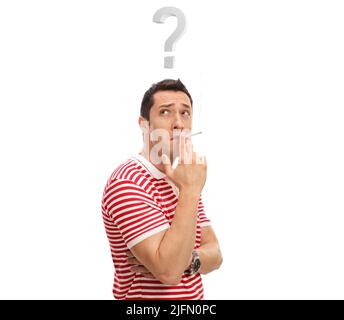 A smoking cigarette with question mark on red background. Smoke as ...