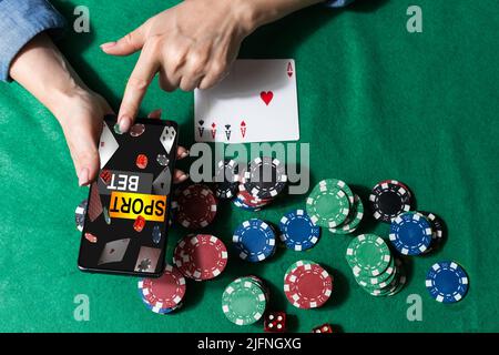 inscription your bet wins on a smartphone on the poker table. Bets ...