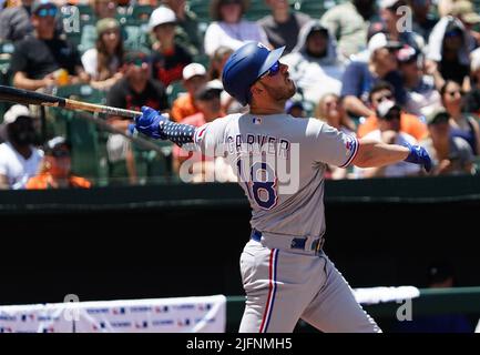 Texas Rangers' Mitch Garver hits a home run off Arizona Diamondbacks starting pitcher Merrill ...