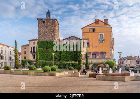 Aerial view of downtown Roanne in France with yellow church, old castle ...
