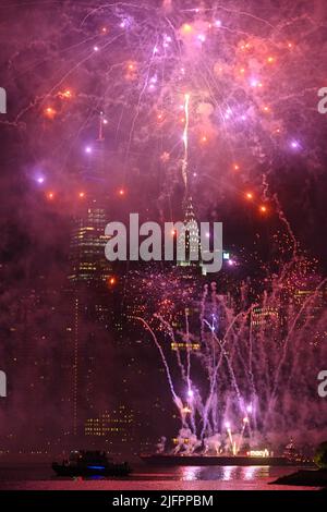 Fireworks up the sky over Manhattan skyline during the celebration of ...