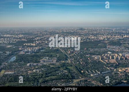 plane above the ground. Aerial city view Stock Photo - Alamy