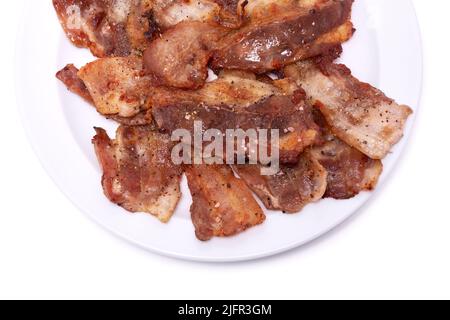 Bacon strips on ceramic plate isolated on white background Stock Photo ...