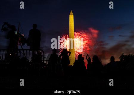 Fireworks explode over the National Mall in honor of Independence Day ...