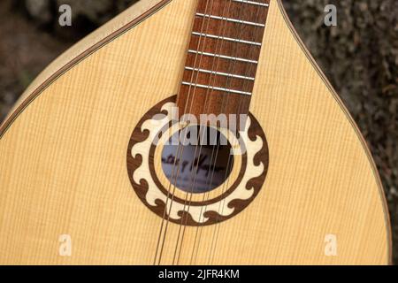The national Greek string-plucked musical instrument Bouzouki was ...