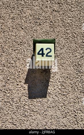 Street sign number 42 on a stone column Stock Photo - Alamy