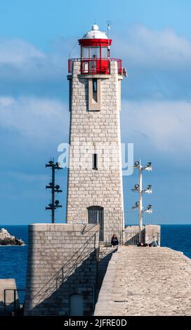 Lighthouse close-up. Harbor entrance. Outdoors on a sunny day Stock ...