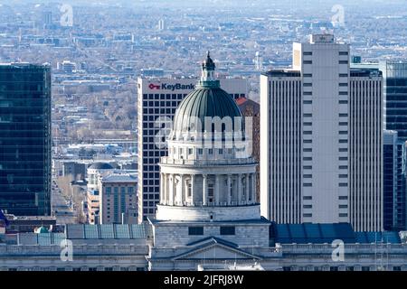 The Utah State Capitol dome wth downtown Salt Lake City, Utah behind ...