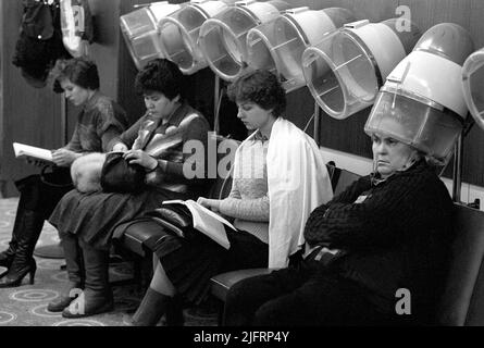 LADIES HAIRDRESSER in Moscow 1981Womam at the row of drying hoods in a ...