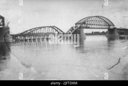 The inflated middle arch of the railway bridge Stock Photo - Alamy