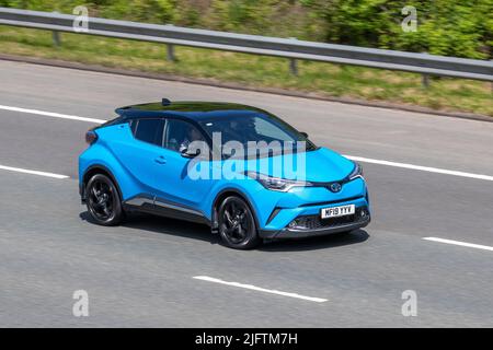 2019 green Toyota C-Hr Lime Edition HEV CVT; UK Vehicular traffic ...