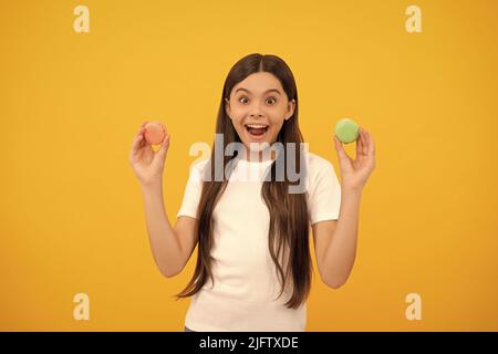 amazed kid hold french macaron or macaroon cookies, sweet life ...