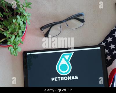 In this photo illustration Petroliam Nasional Berhad (PETRONAS) logo ...