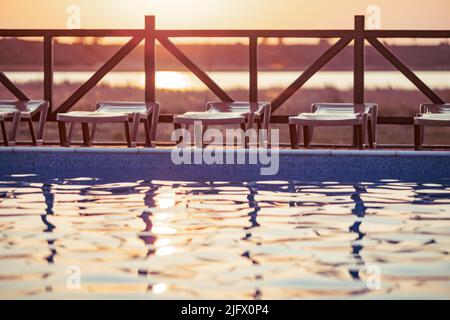 A small poolside against a beautiful view of a town Stock Photo - Alamy