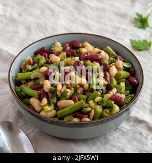 Homemade Three Bean Salad in a Bowl on a black background, top view ...
