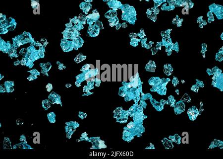 Blue copper sulphate crystals under 4x microscope magnification - image ...