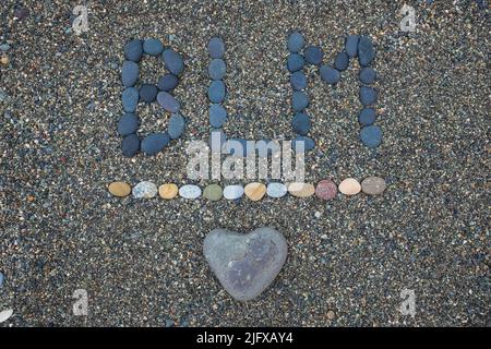 Lettering BLM Black lifes matter made from stones.. Concept of stopping ...