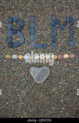 Lettering BLM Black lifes matter made from stones.. Concept of stopping ...