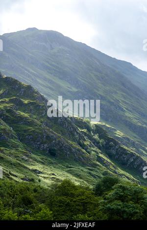 Sgurr Fhuaran and the five sisters ridge in the morning sun, with ...