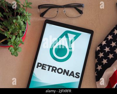 In this photo illustration Petroliam Nasional Berhad (PETRONAS) logo ...