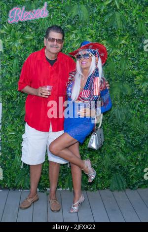 attend the July 3rd Patriotic Sunset Soiree at a private residence in ...