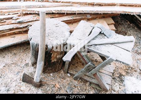 frosted axe on wooden table mechanical instrument Stock Photo - Alamy
