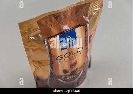 Tchibo Gold Selection coffee against gray. Tchibo German company ...